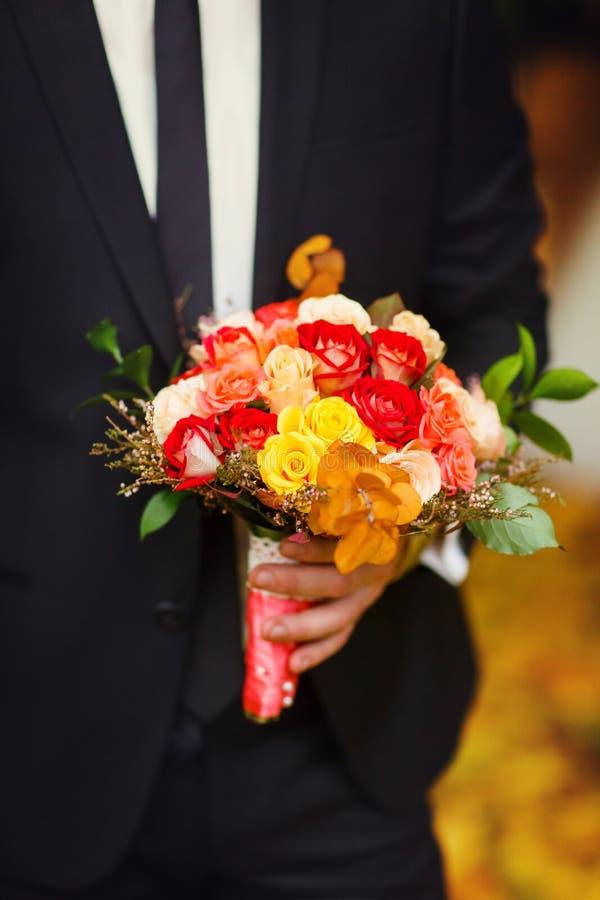 Groom Holds a Red Bouquet of Little Roses Stock Photo - Image of ...