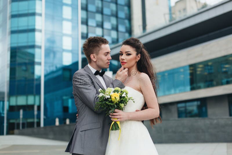 Groom looking at his bride stock image. Image of outdoors - 80043049