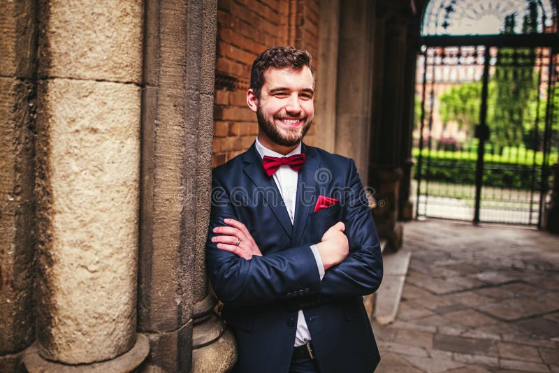 Groom Posing Near the Columns Stock Photo - Image of door, architecture ...