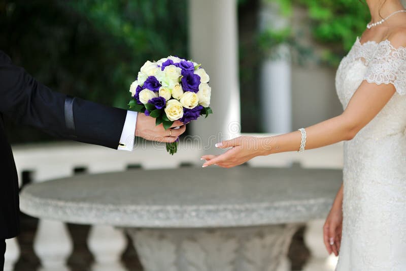 Groom Presents the Bride Bouquet Stock Image - Image of love, flirting ...