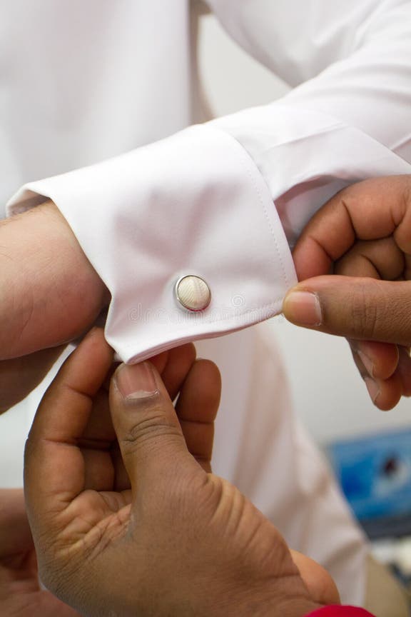 Groom Putting on His Cufflinks Stock Photo - Image of custom, unique ...
