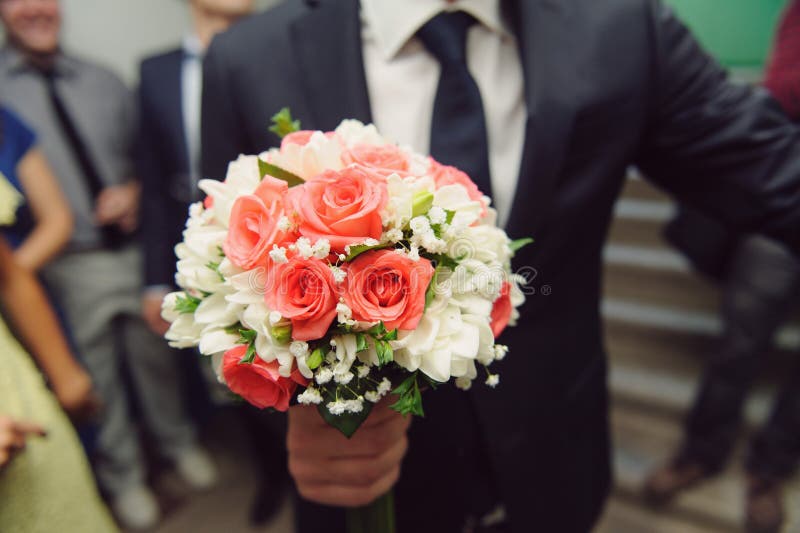 Groom with Rose Bouquet stock photo. Image of blossom - 46342030