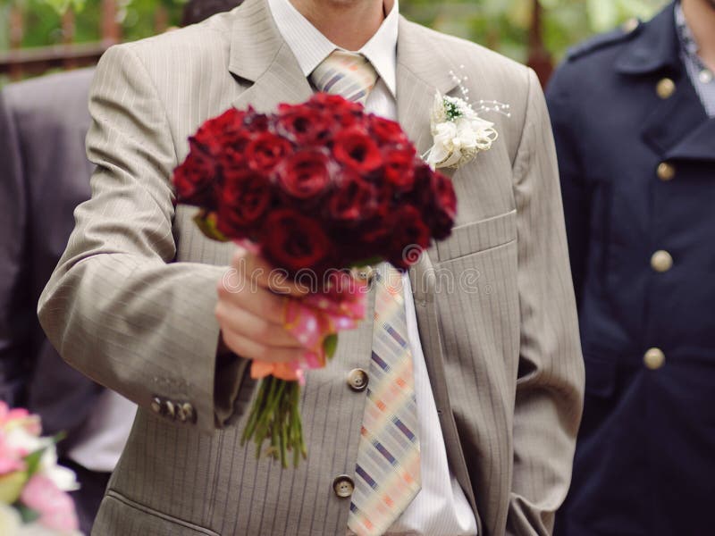 Groom Showing Bouquet stock image. Image of married, couple - 51023215