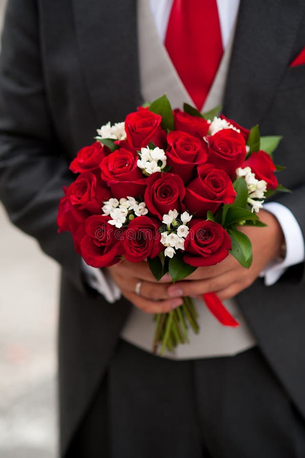 Groom Showing Her Rose Bouquet Stock Photo - Image of beautiful, groom ...