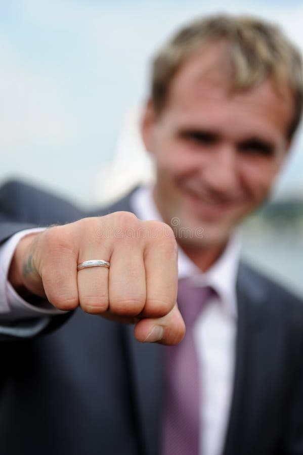 Groom shows a ring stock photo. Image of events, attractive - 46644418