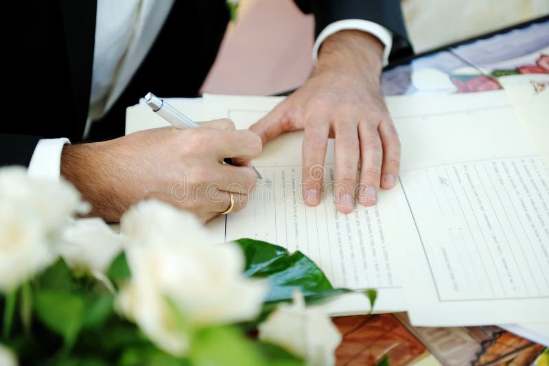 Groom Signing Wedding Contract Stock Image - Image of married, couple ...