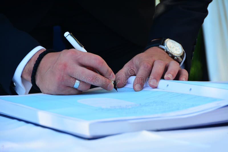 Groom Signing the Marriage Register Book Stock Photo - Image of ...