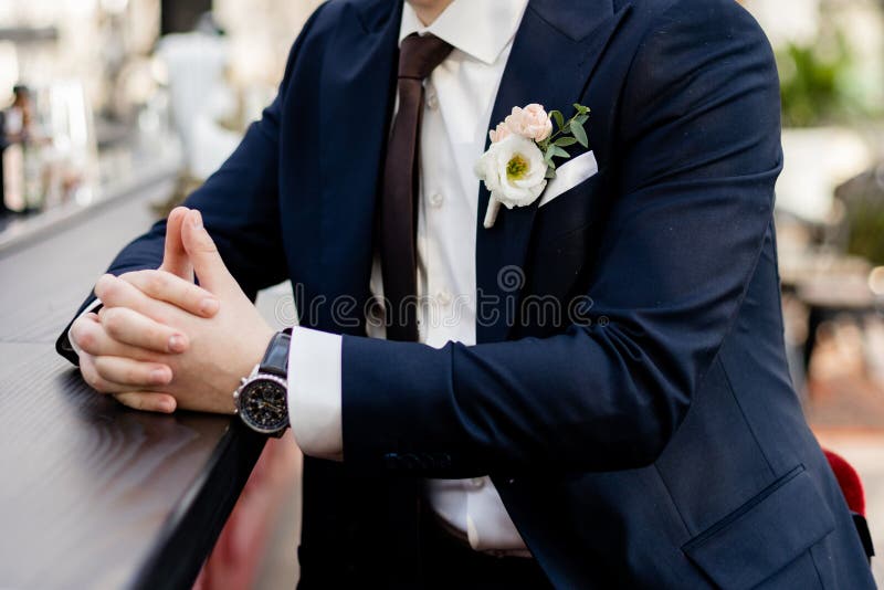 The Groom in a Suit is Sitting at the Bar Waiting for the Bride at the ...