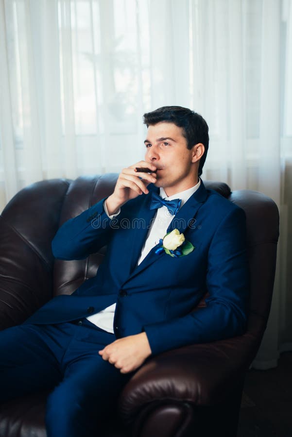 The Groom in a Suit Smoking Cigar Stock Photo - Image of male ...
