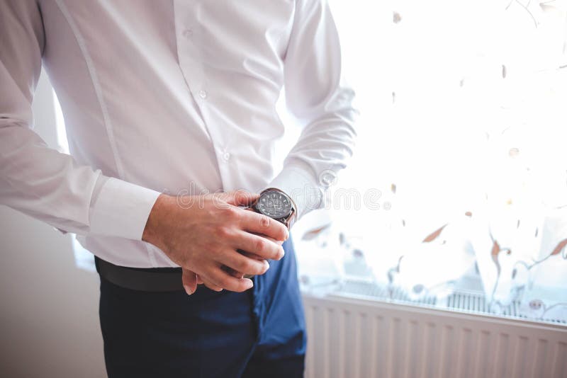 Groom with a White Shirt Touching His Watch Stock Photo - Image of ...