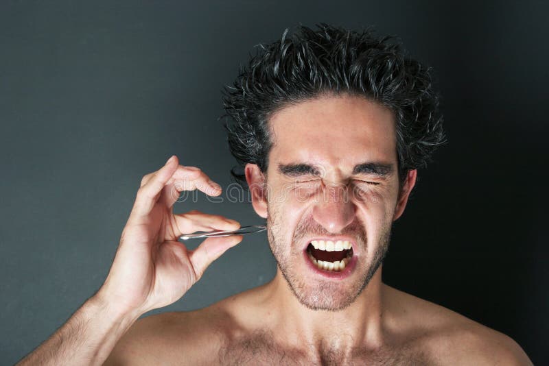 Grooming - Man with Painful Expression Stock Image - Image of painful ...