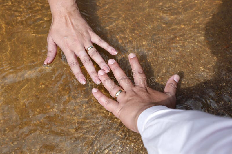 United Hands and Wedding Rings Stock Photo - Image of celebration ...