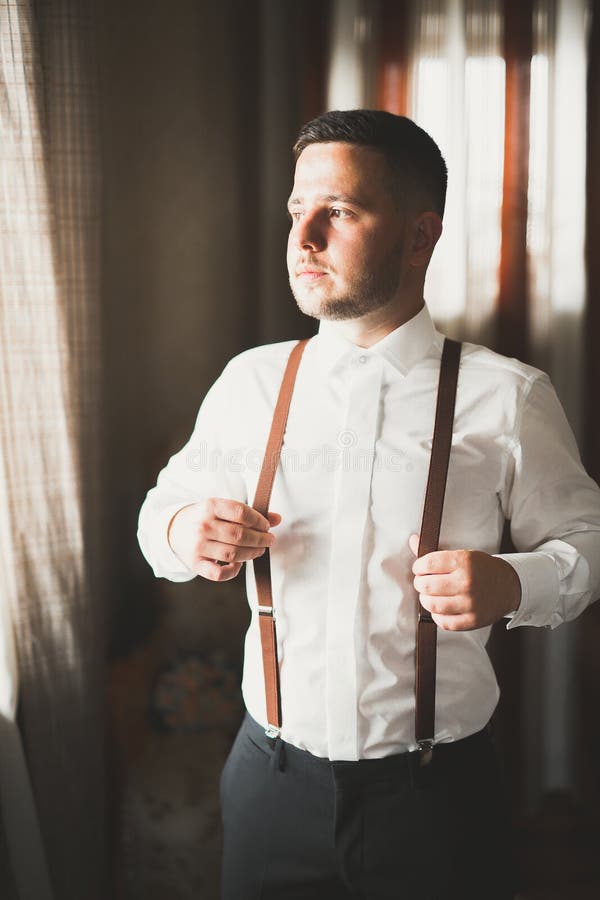 Grooms Morning Preparation. Handsome Man Getting Dressed and Preparing ...
