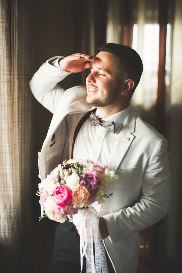 Grooms Morning Preparation. Handsome Man Getting Dressed and Preparing ...