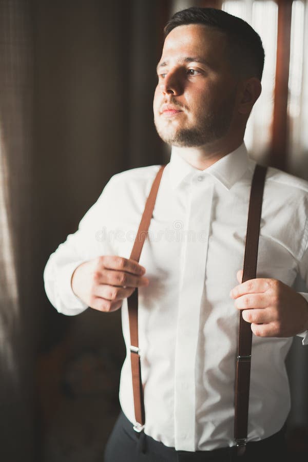 Grooms Morning Preparation. Handsome Man Getting Dressed and Preparing ...
