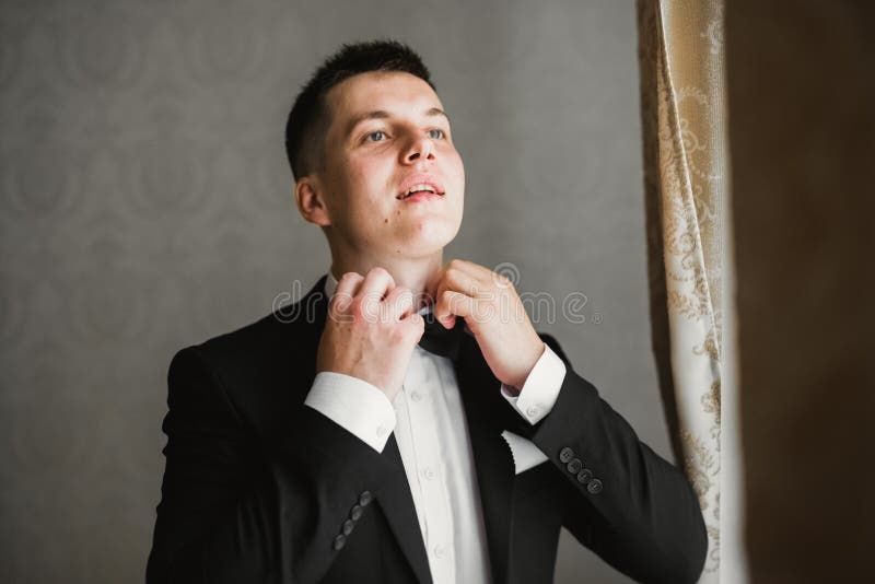Grooms Morning Preparation. Handsome Man Getting Dressed and Preparing ...