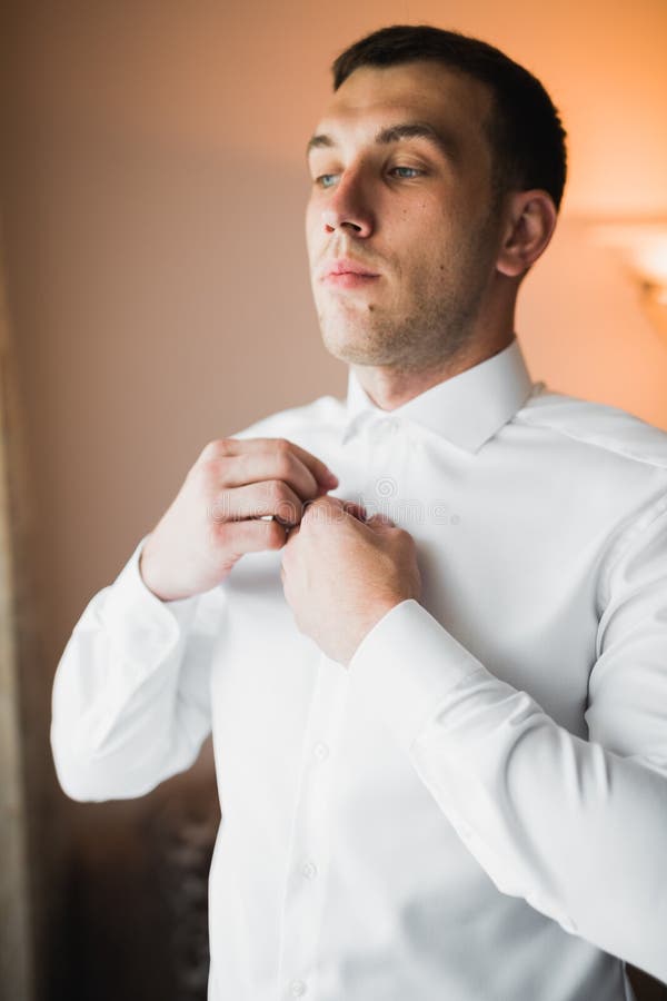 Grooms Morning Preparation. Handsome Man Getting Dressed and Preparing ...