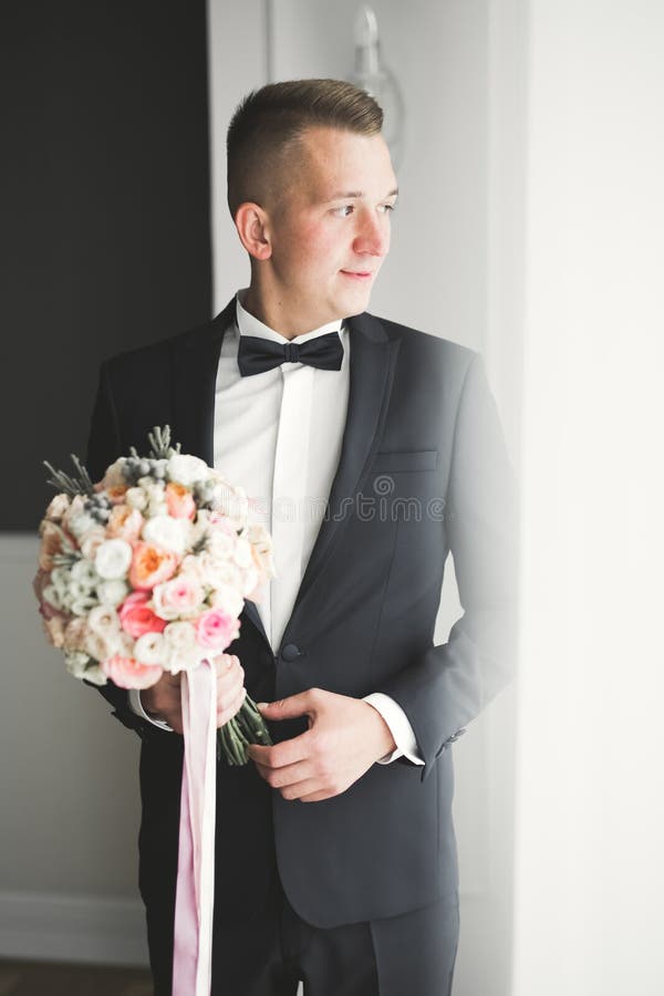 Grooms Morning Preparation. Handsome Man Getting Dressed and Preparing ...