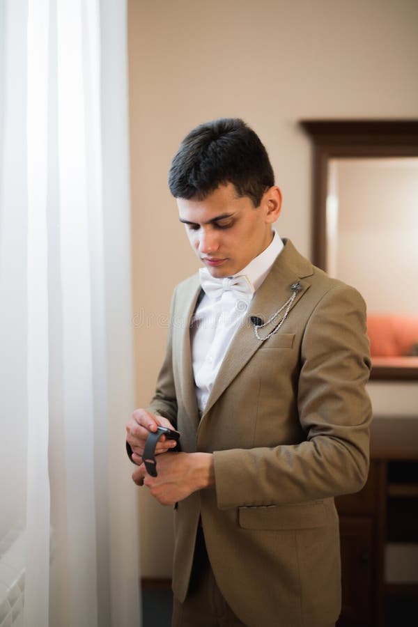 Grooms Morning Preparation. Handsome Man Getting Dressed and Preparing ...