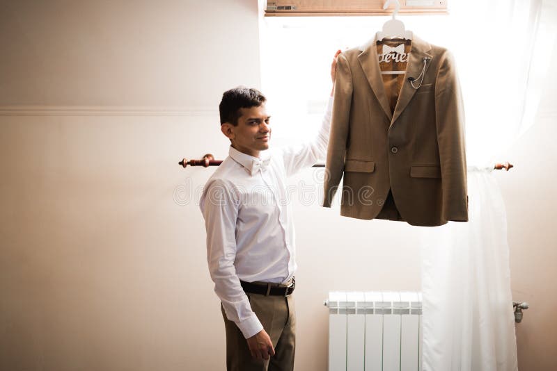 Grooms Morning Preparation. Handsome Man Getting Dressed and Preparing ...