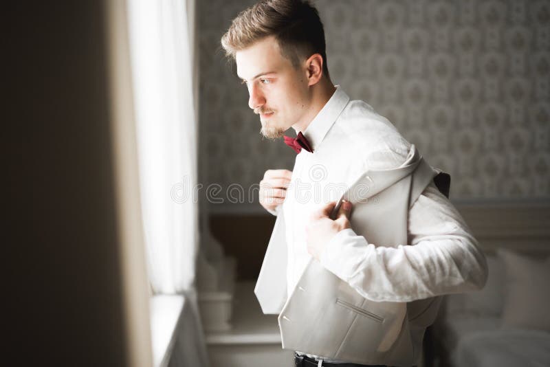 Grooms Morning Preparation. Handsome Man Getting Dressed and Preparing ...