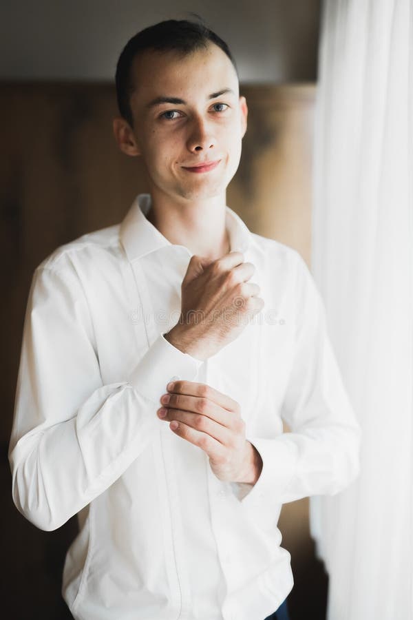 Grooms Morning Preparation. Handsome Man Getting Dressed and Preparing ...