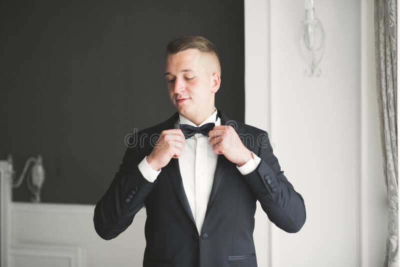 Grooms Morning Preparation. Handsome Man Getting Dressed and Preparing ...