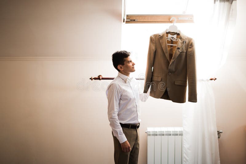 566 Man Getting Dressed Tuxedo Stock Photos - Free & Royalty-Free Stock ...