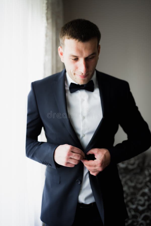 Grooms Morning Preparation. Handsome Man Getting Dressed and Preparing ...