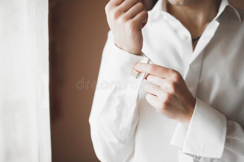 Grooms Morning Preparation. Handsome Man Getting Dressed and Preparing for the Wedding Stock ...