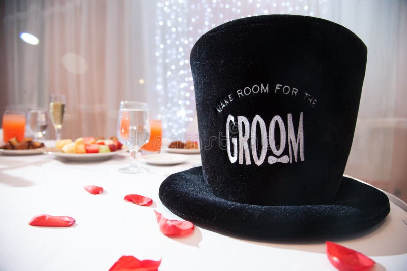 Grooms top hat on table stock photo. Image of groom, table - 33515922