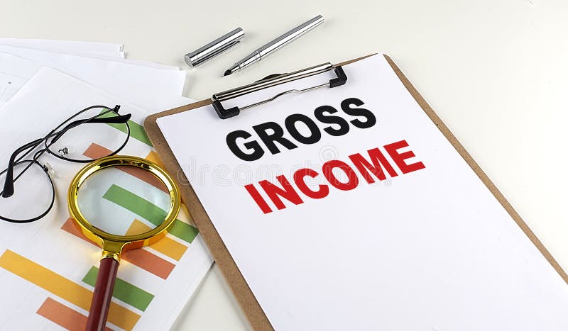 NET INCOME Text on Notebook with Clipboard on White Background Stock ...