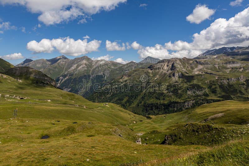 The Grossglockner Mountain Range with Snow on the Peaks and a Blue Sky ...