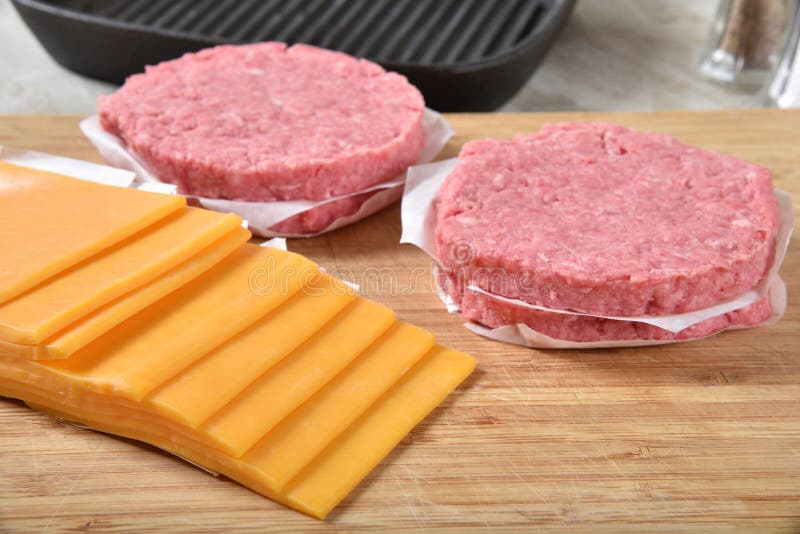 Ground Beef Patties and Cheese Stock Image - Image of cooking ...