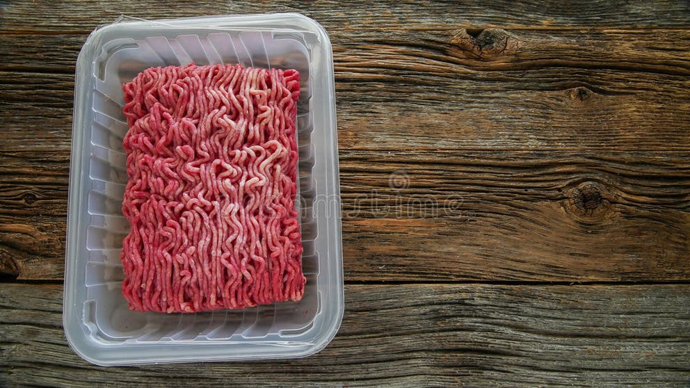 Ground Beef in Plastic Try on Table Stock Photo - Image of cooking ...
