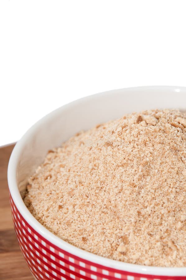Ground Biscuits for Preparing Cake in White Bowl on Wooden Board Stock ...