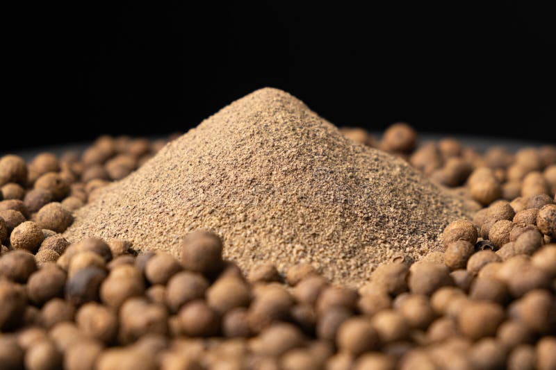 Ground Black Pepper and Peppercorns Close-up. Stock Image - Image of ...