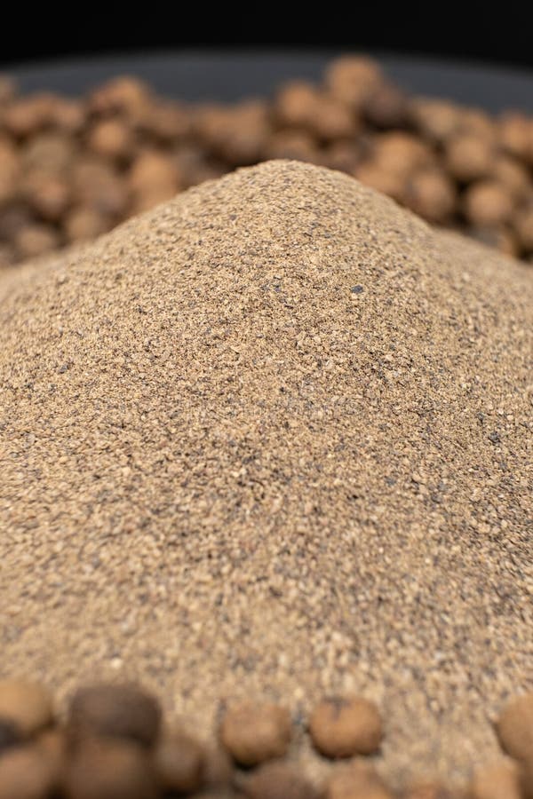 Ground Black Pepper and Peppercorns Close-up. Stock Image - Image of ...