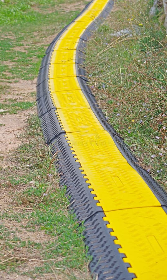 Ground Cable Protector stock photo. Image of cable, commercial - 123394544