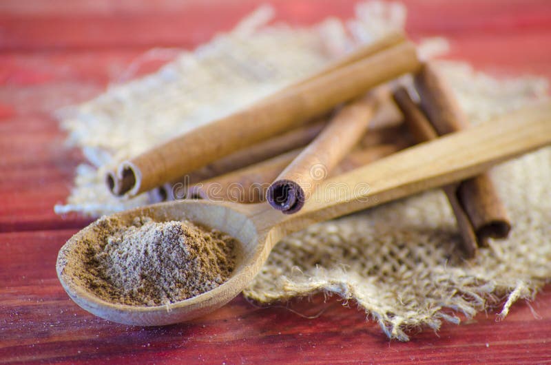 Ground Cinnamon and Cinnamon Sticks Dry Stock Photo - Image of ground ...
