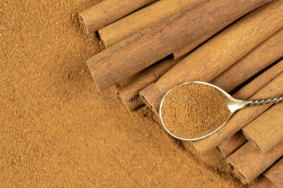 Ground Cinnamon Spice in a Spoon and Cinnamon Sticks, Top View Stock Image - Image of powdered ...