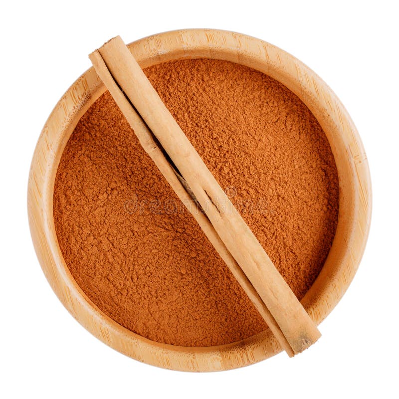 Ground Cinnamon and Cinnamon Sticks in Wooden Bowl Isolated on White ...