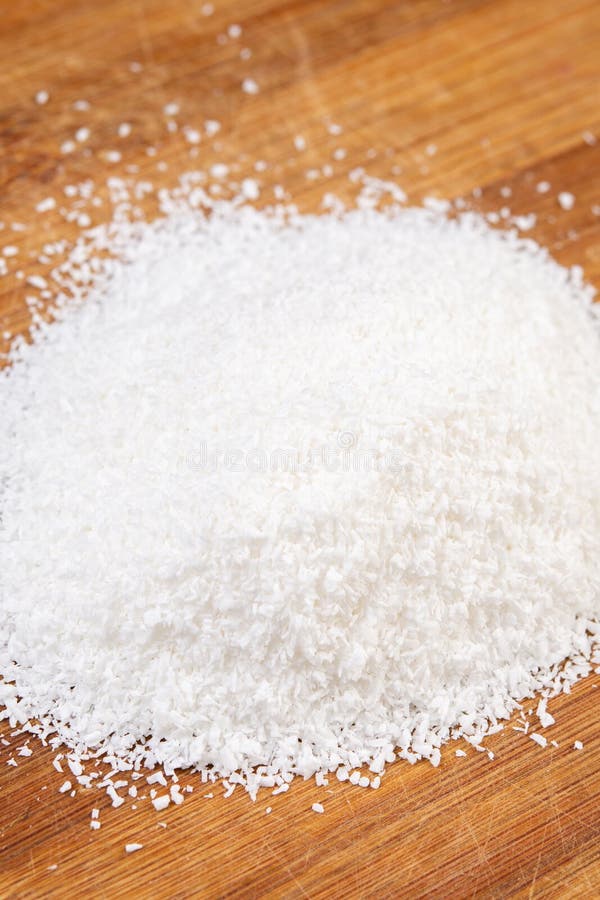 Ground Coconut on the Wooden Kitchen Board Stock Image - Image of ...