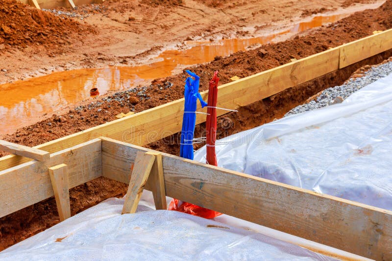 Ground is Covered with a First Layer of Insulation Waterproofing Prior ...