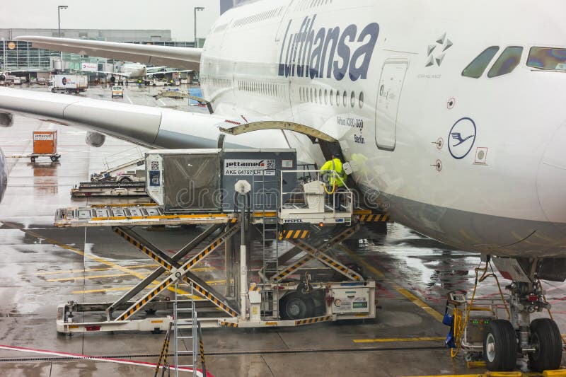 Ground Crew Loading an Aircraft Editorial Stock Photo - Image of cargo ...