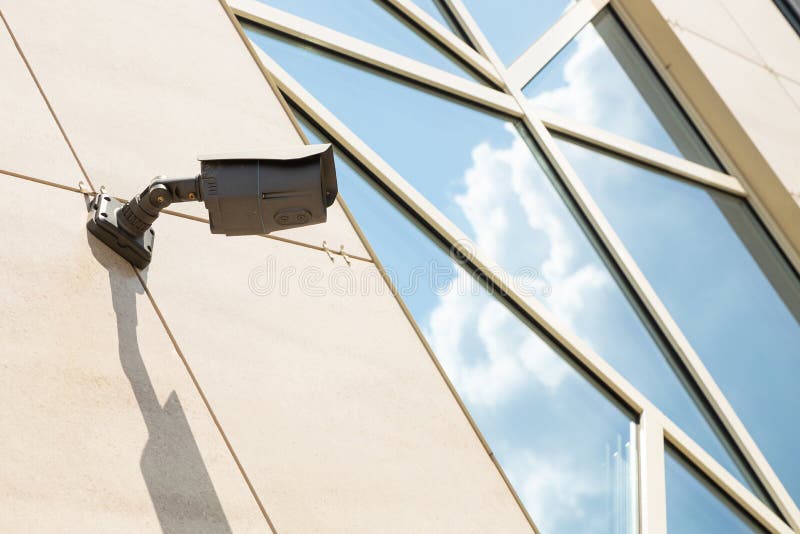 Ground Diagonal View of Safety Camera on Beige Tiled Wall Surface with ...