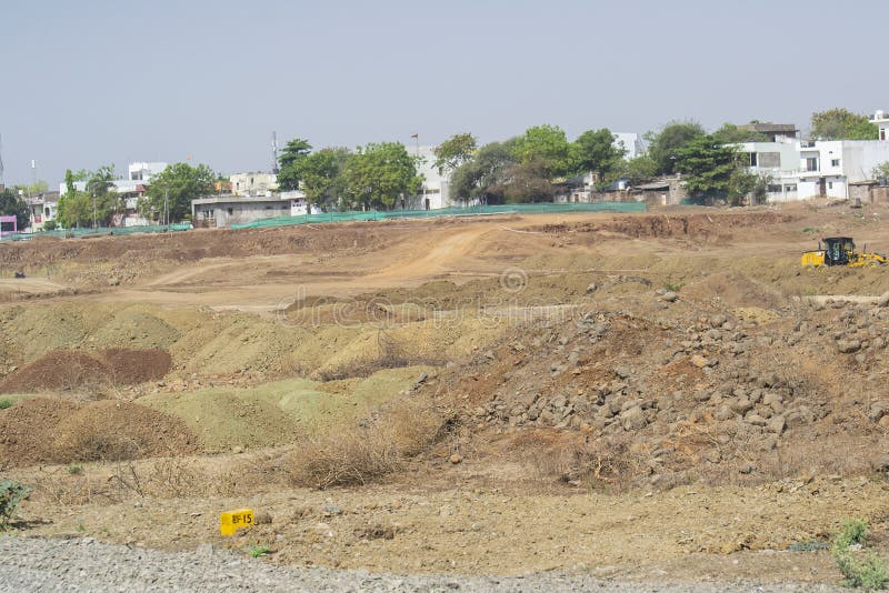 Ground Digging Work with Digger Machines at the Construction Site Stock ...