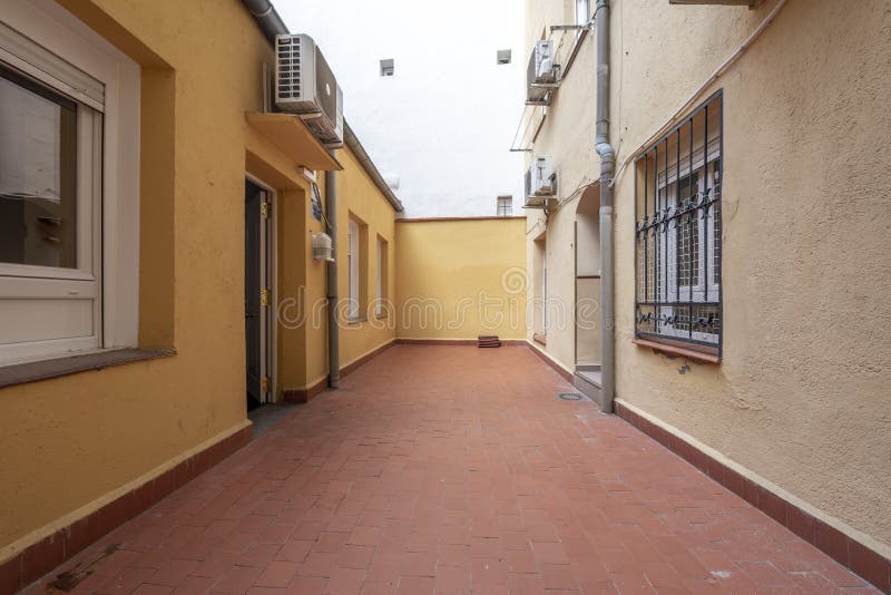Ground Floor House with Several Windows and Patio Stock Photo - Image ...