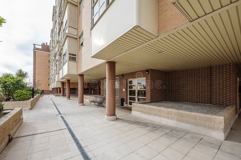 Ground Floor of Some Buildings with Access Portals and Planters with ...