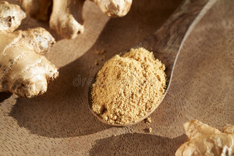Ground Ginger Powder with Fresh Ginger Root Stock Photo - Image of ...